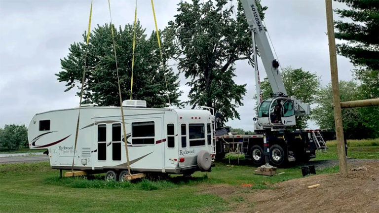 A couple created a treehouse RV by using a crane to lift their 7,000 ...